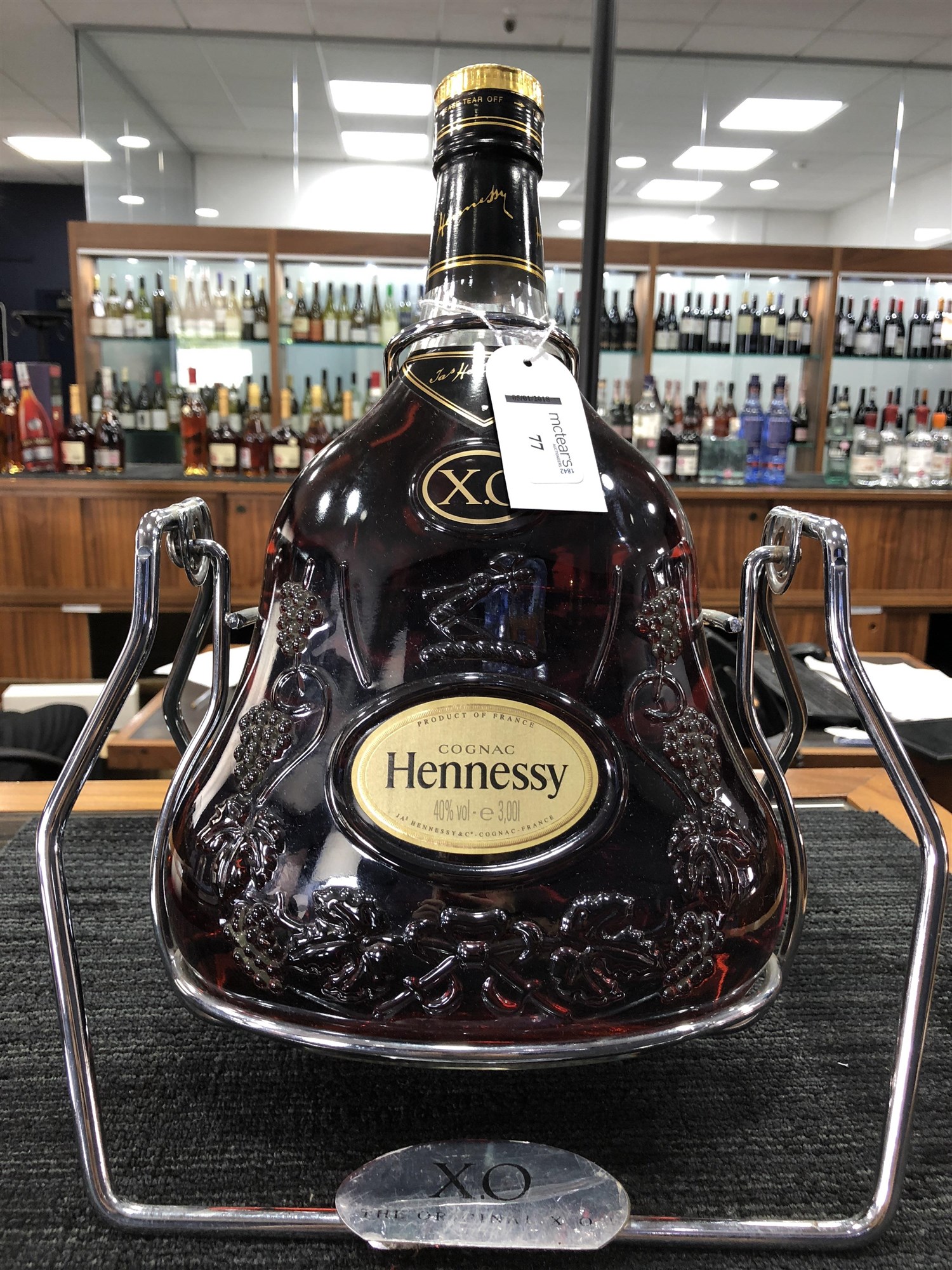 Lot 77 - UPDATE:A DISPLAY BOTTLE OF HENNESSY COGNAC XO