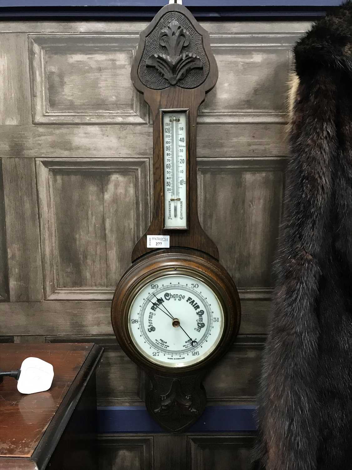 Lot 277 - AN OAK BANJO BAROMETER