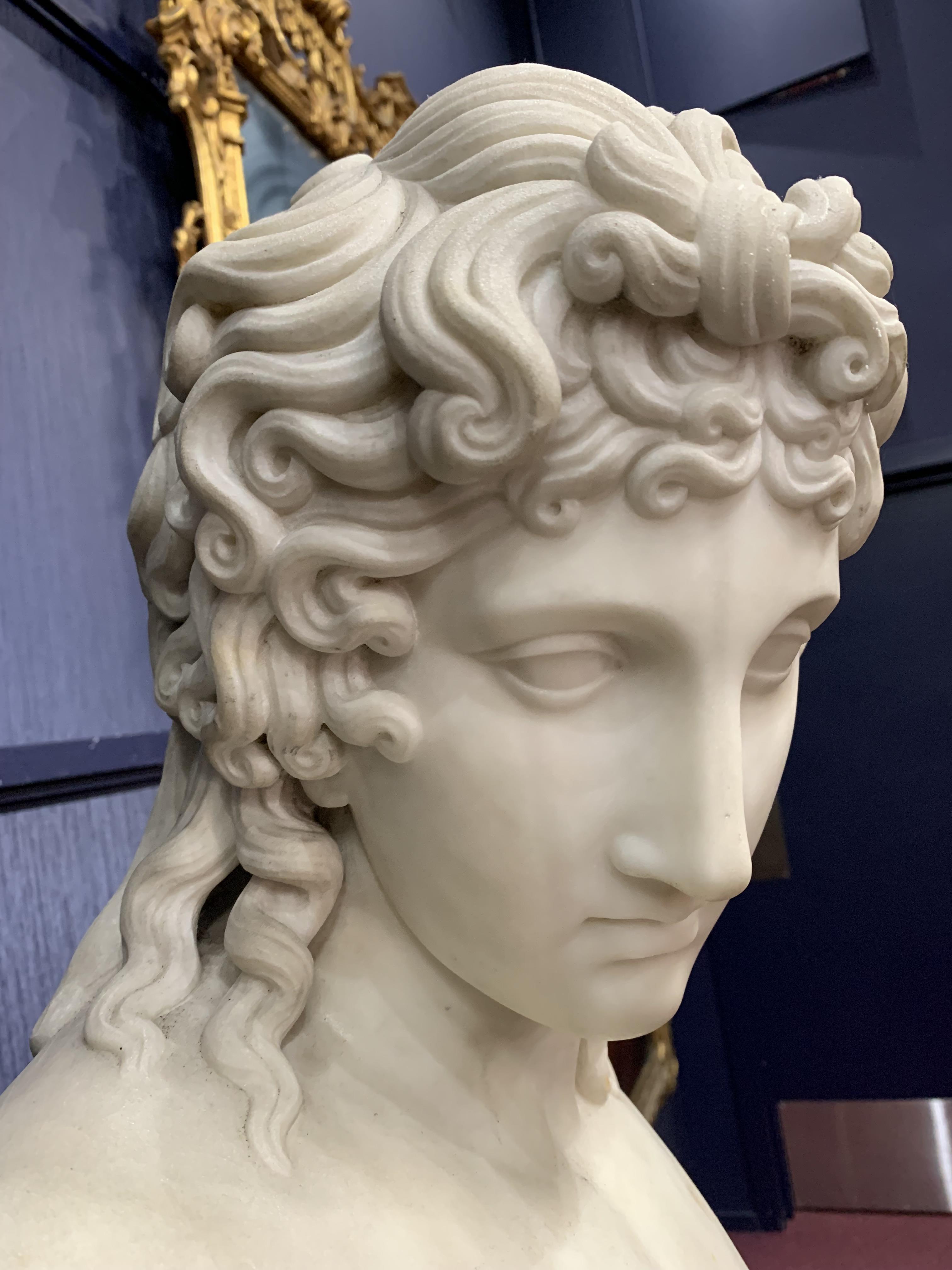 Lot 1205 - A GRAND TOUR CARRARA MARBLE TORSO OF APOLLO