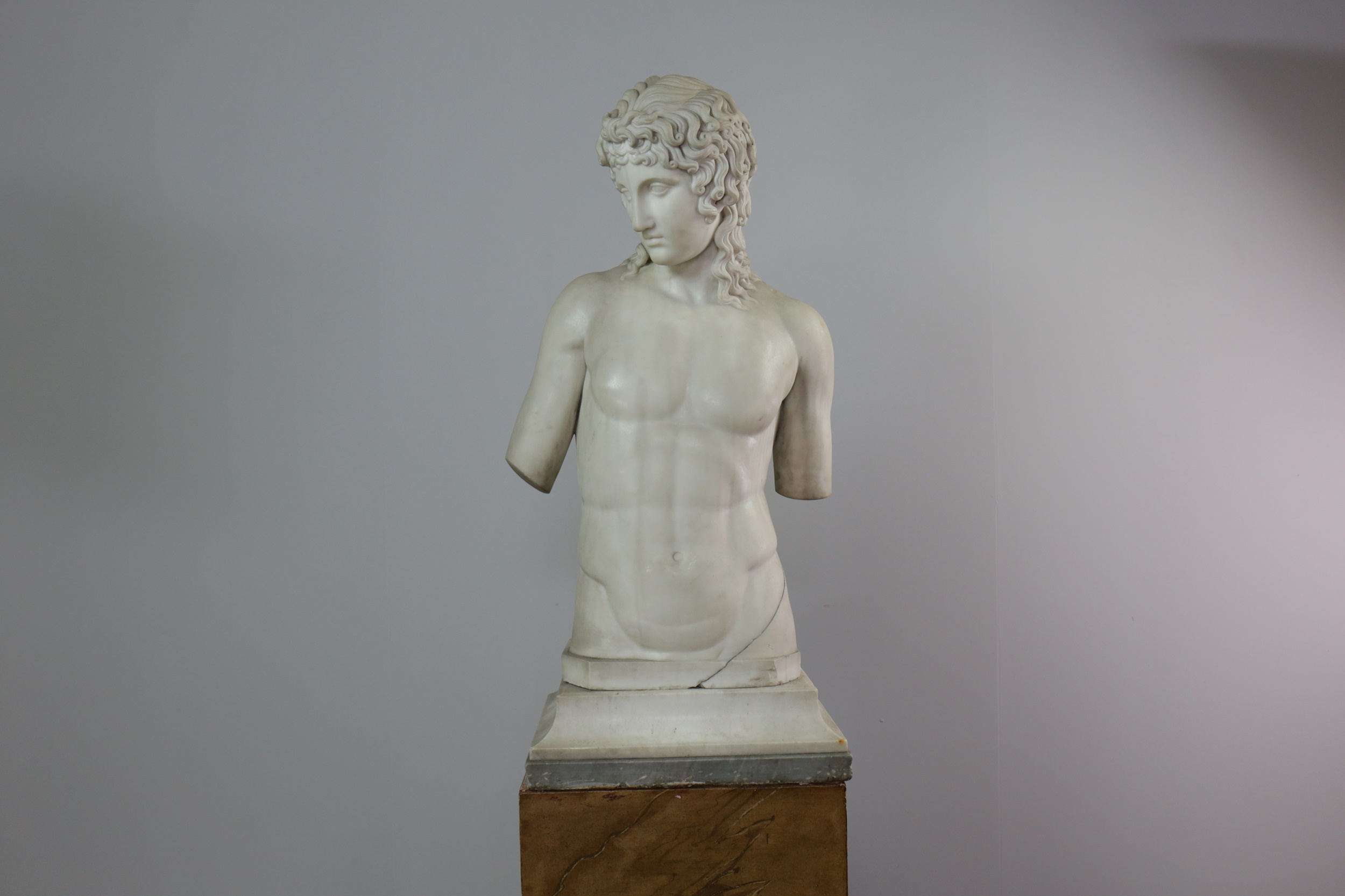 Lot 1205 - A GRAND TOUR CARRARA MARBLE TORSO OF APOLLO