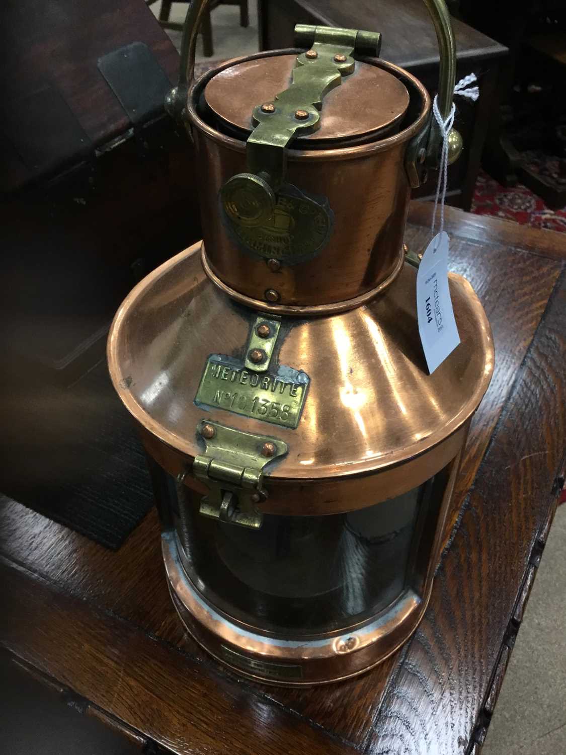 Lot 1604 - A SHIP'S COPPER 'METEORITE' LAMP BY WM.