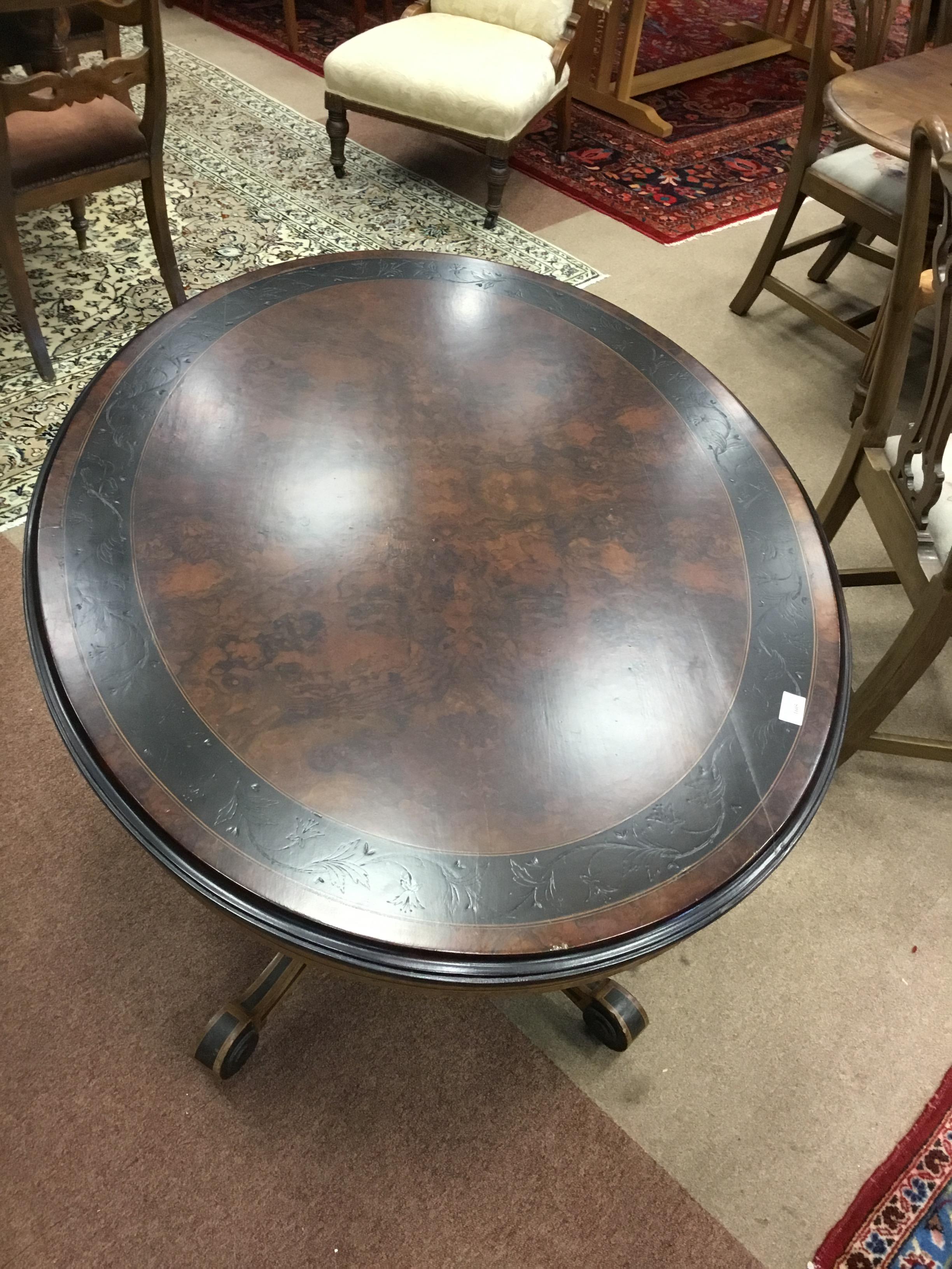 Lot 1605 - A VICTORIAN WALNUT AND EBONISED OVAL LOO