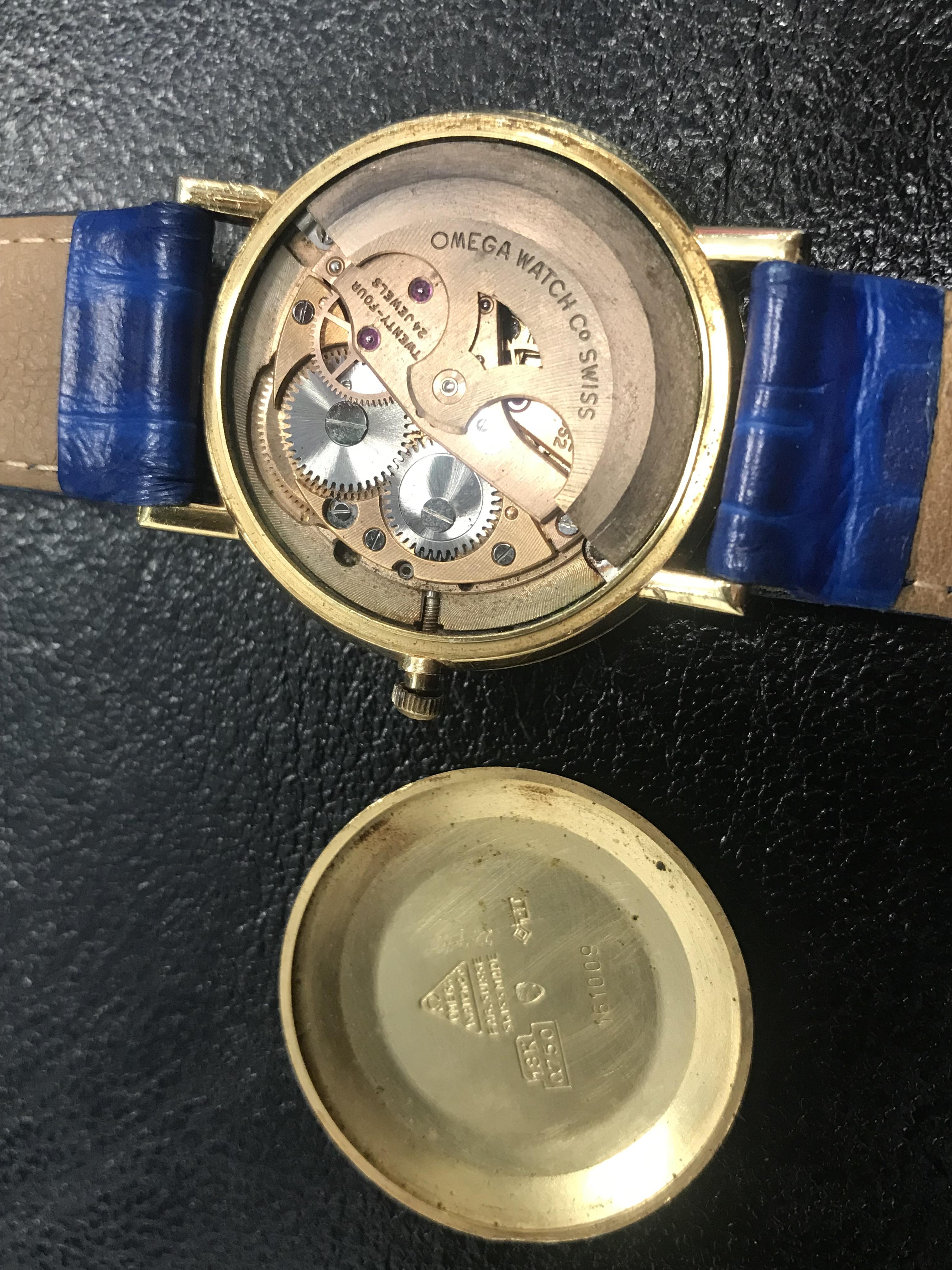 Lot 914 - A GENTLEMAN'S OMEGA TURLER EIGHTEEN CARAT