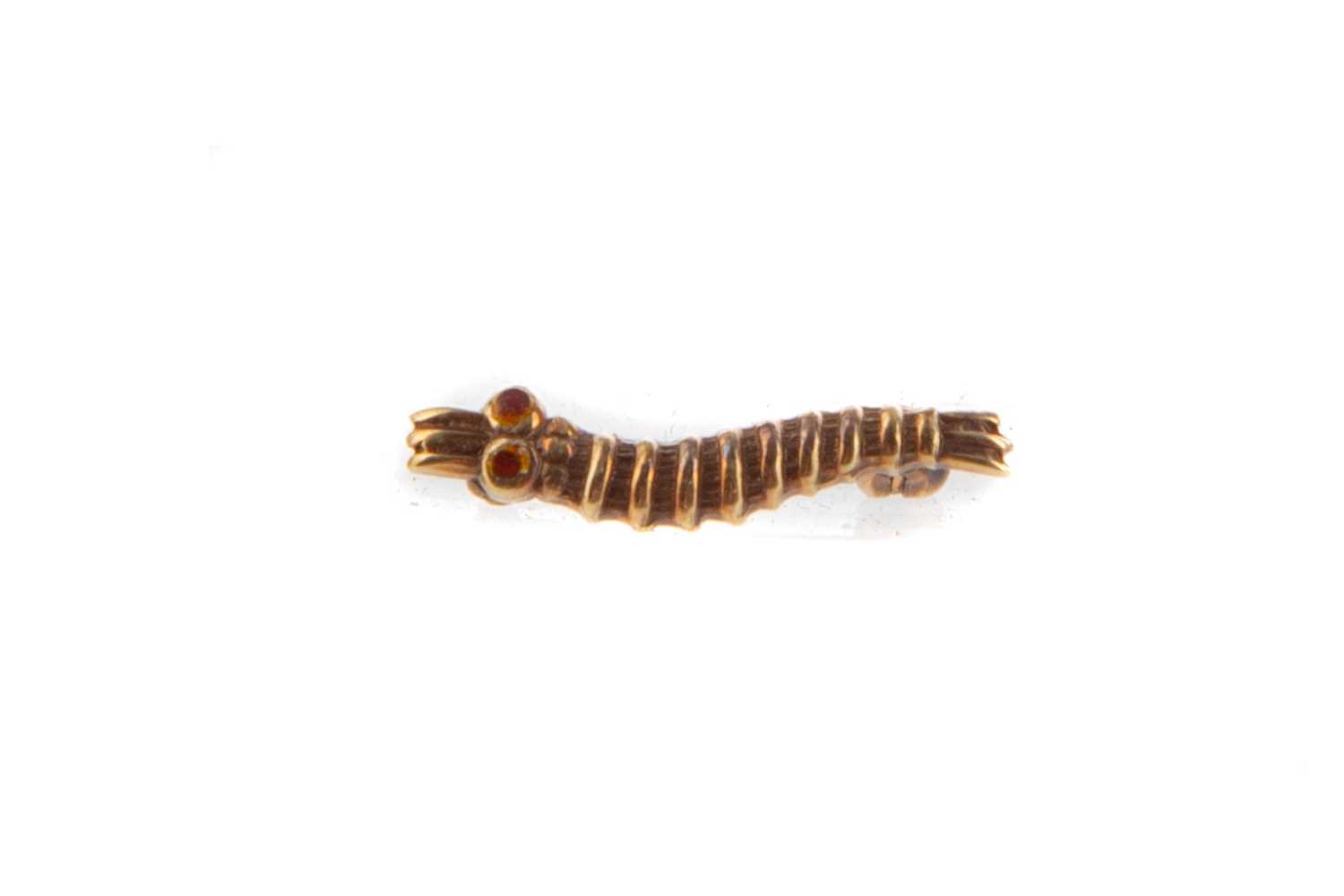 Lot 118 - A RARE NINE CARAT GOLD CATERPILLAR CLUB