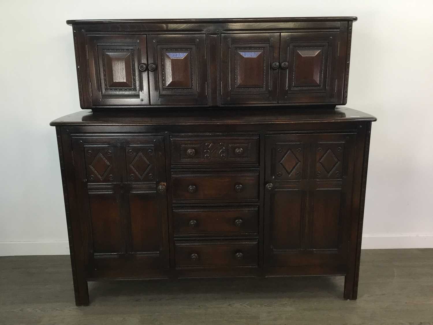 Lot 211 - AN ERCOL DARK REFECTORY STYLE DINING TABLE,