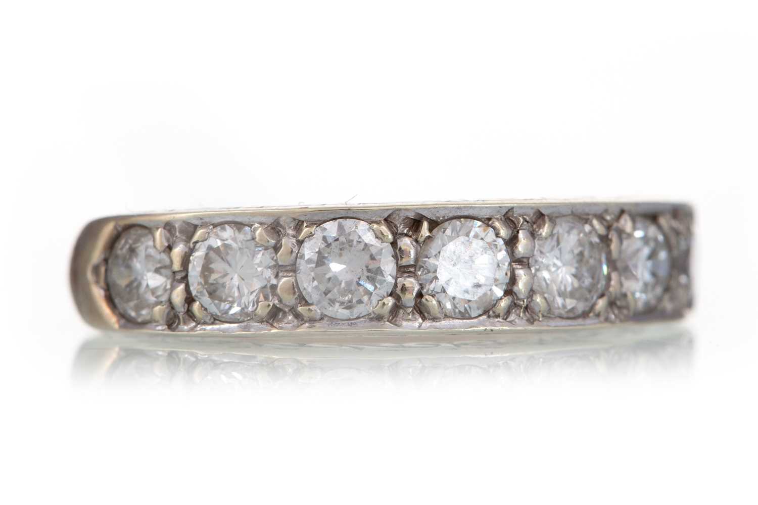 Lot 453 - DIAMOND SEVEN STONE RING