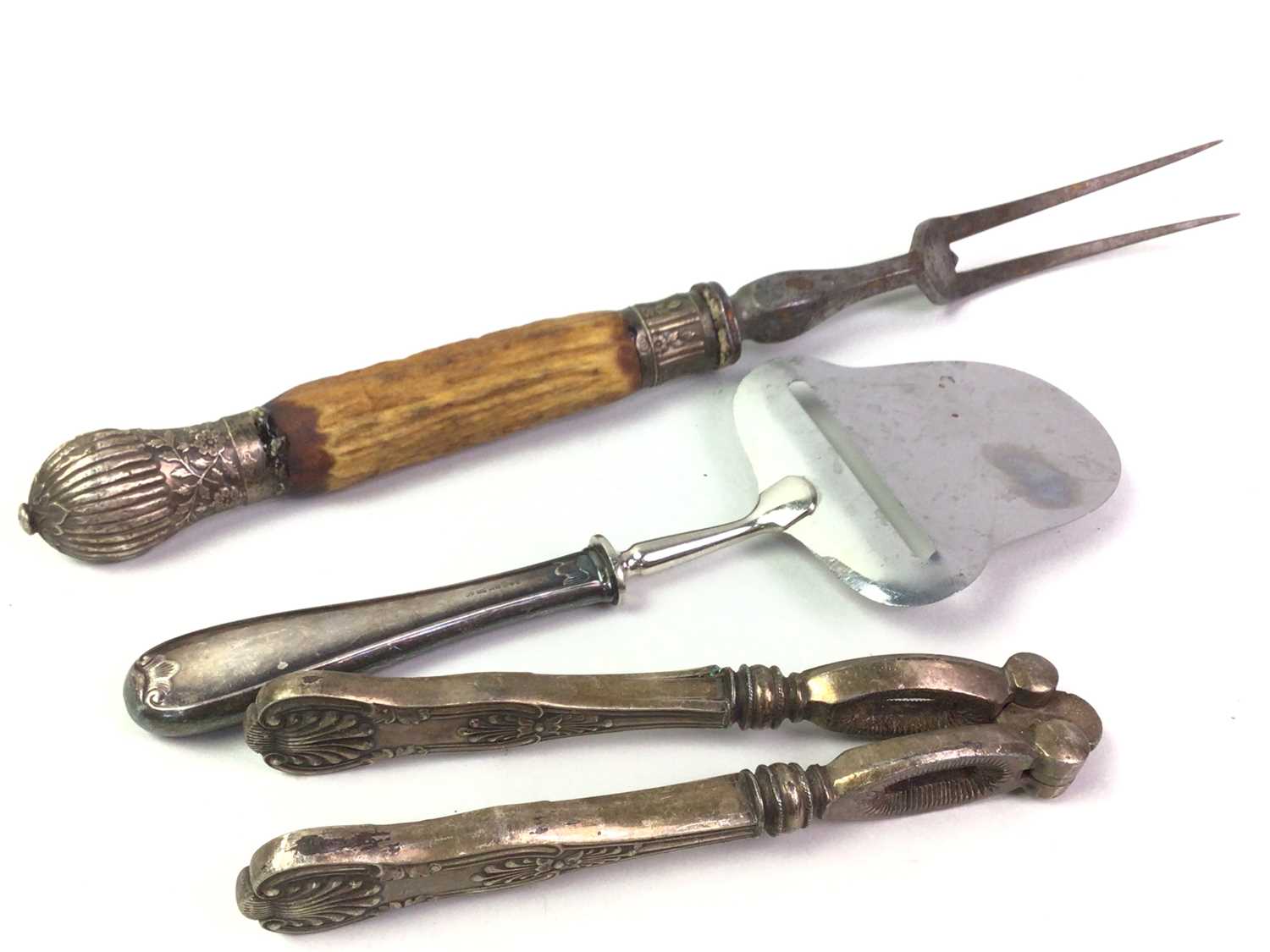 Lot 68 - SILVER HANDLED CARVING FORK,