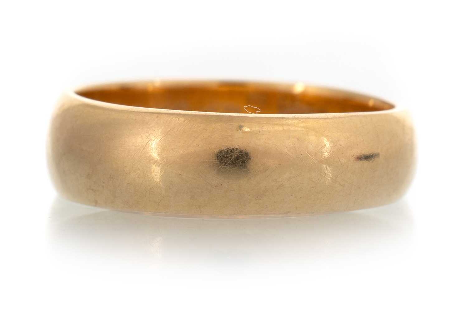 Lot 535 - GOLD WEDDING BAND,