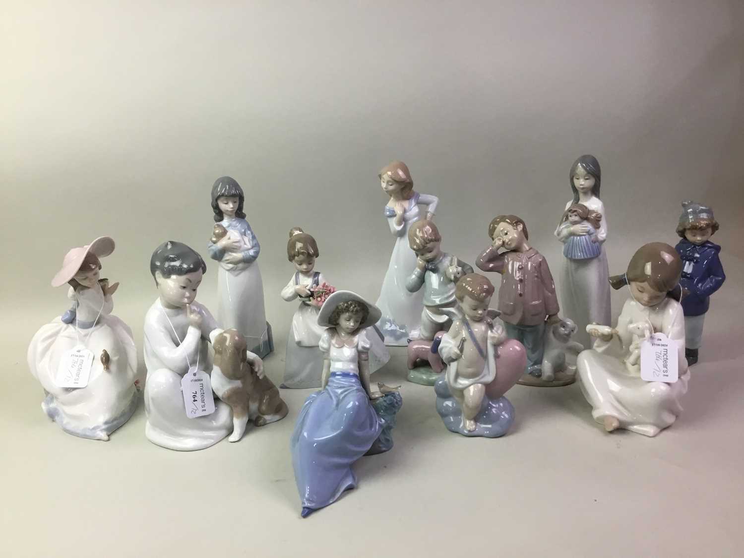 Lot 764 - GROUP OF NAO FIGURES,