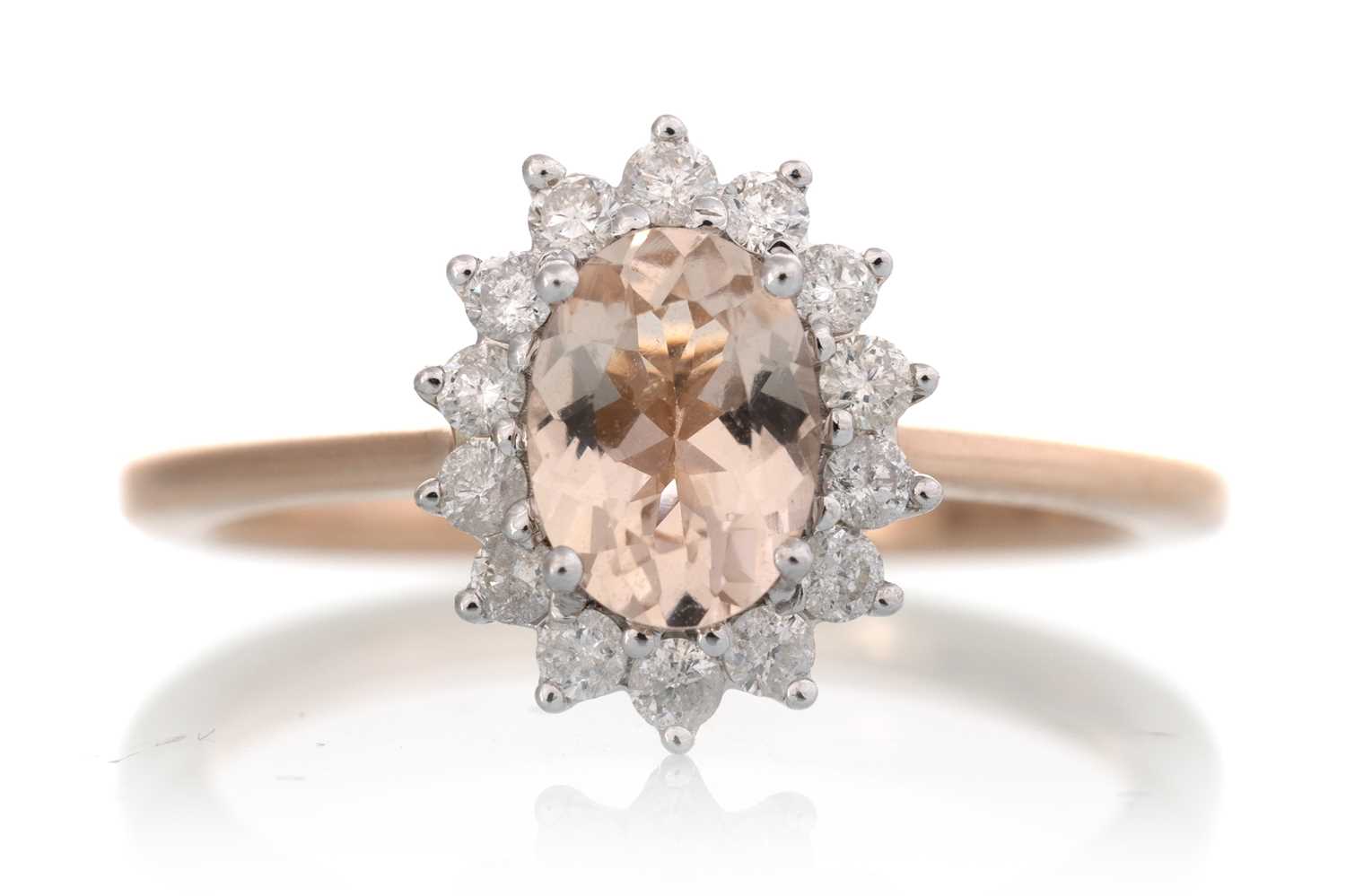 Lot 528 - MORGANITE AND DIAMOND CLUSTER RING,