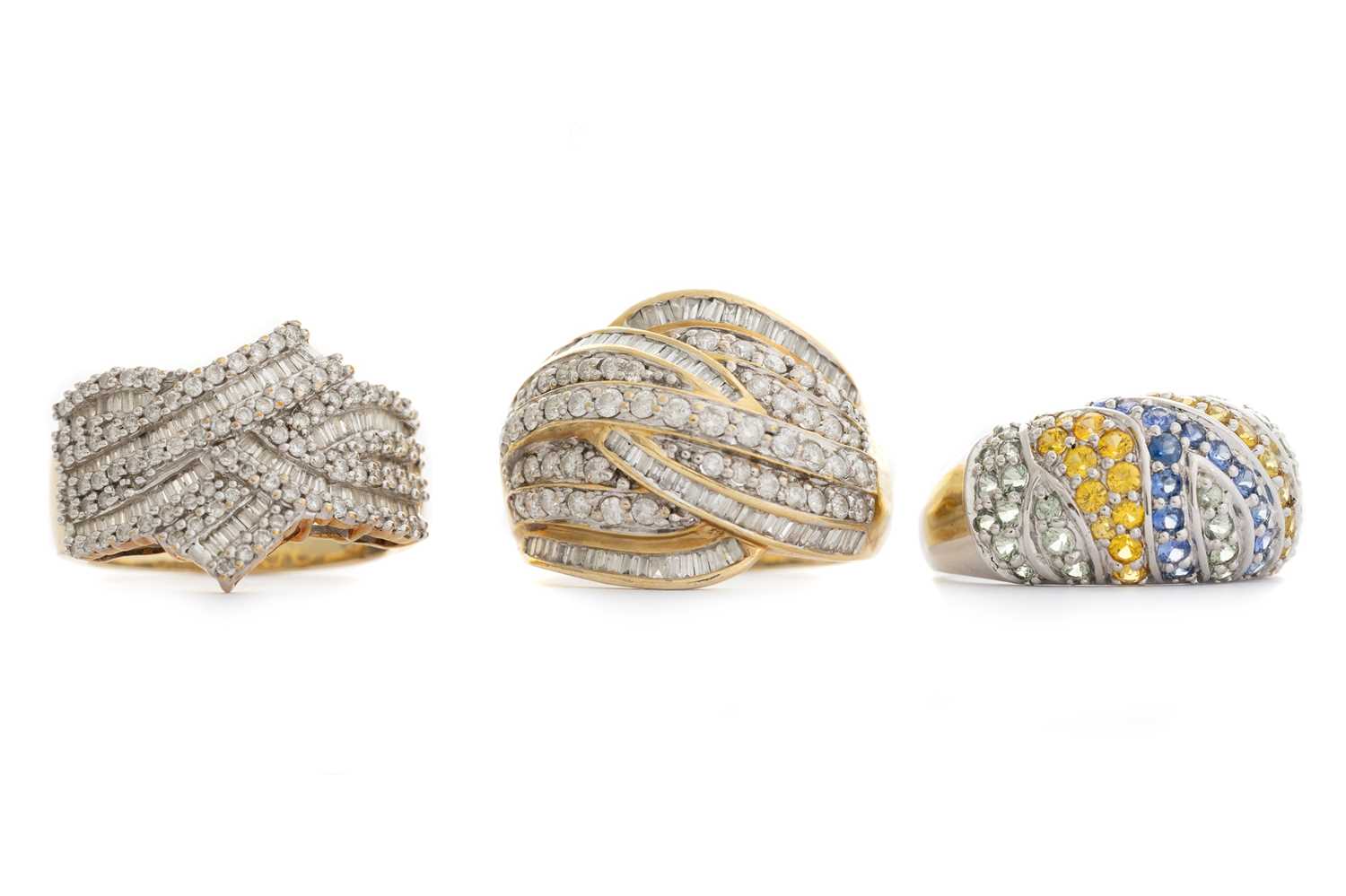 Lot 690 - THREE DIAMOND DRESS RINGS,