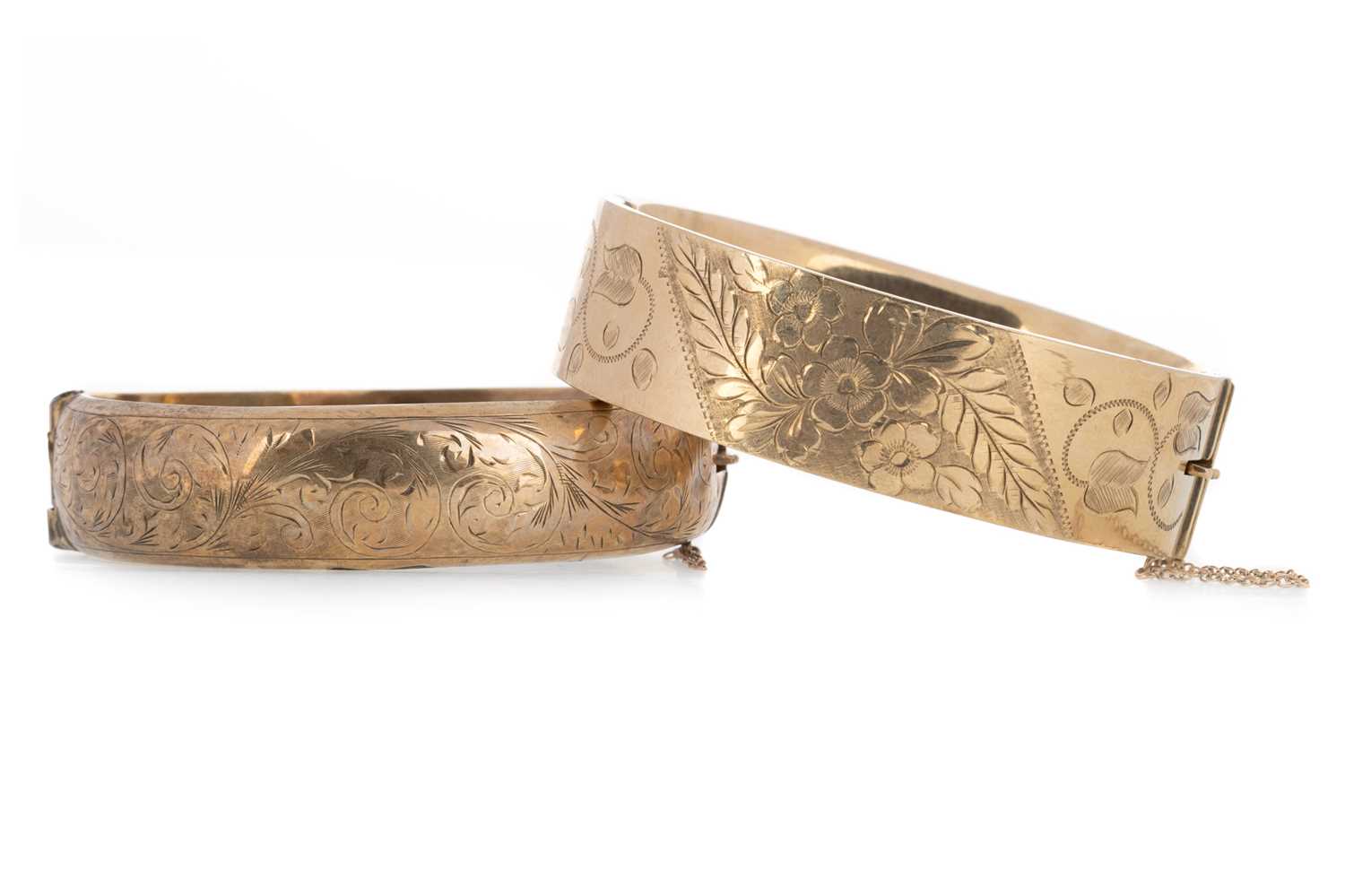 Lot 457 - THREE GOLD BANGLES,