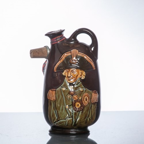 Lot 1373 - DEWAR'S NELSON CERAMIC FLAGON Blended
